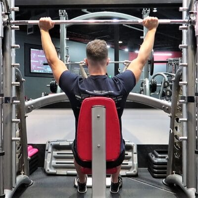 Smith Machine Shoulder Press Do's And Don'ts For Bigger Delts
